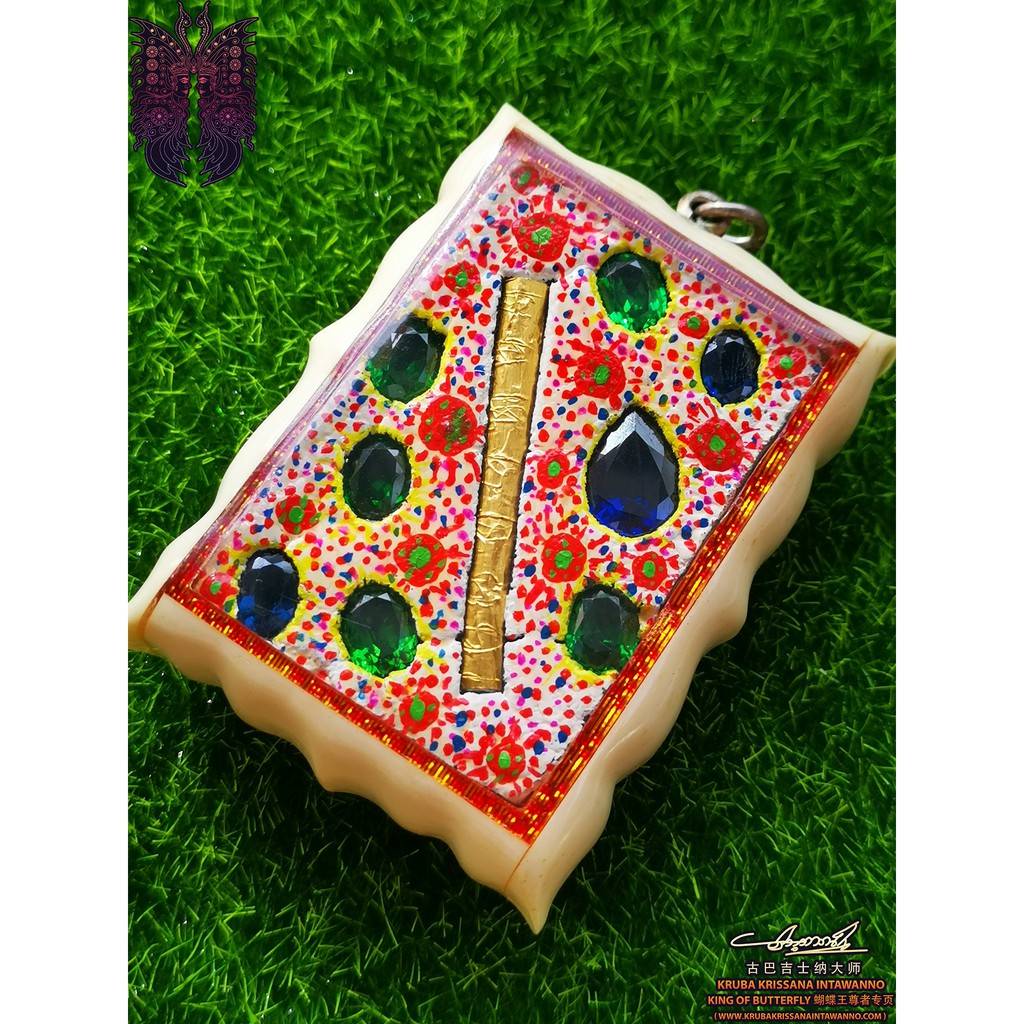 Kruba Krissana~Ngar Chang Thep Jamlang-纯象牙雕刻-混合经粉所制作的蝴蝶佛牌-已包鹿角外壳